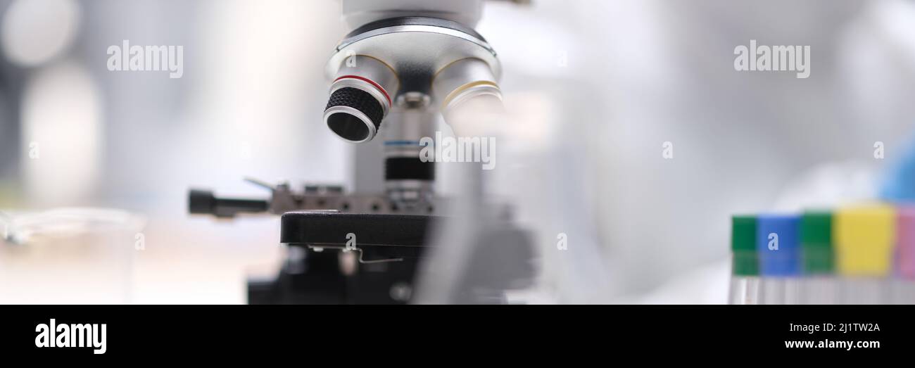 Laboratory, on the table a microscope and beakers Stock Photo - Alamy