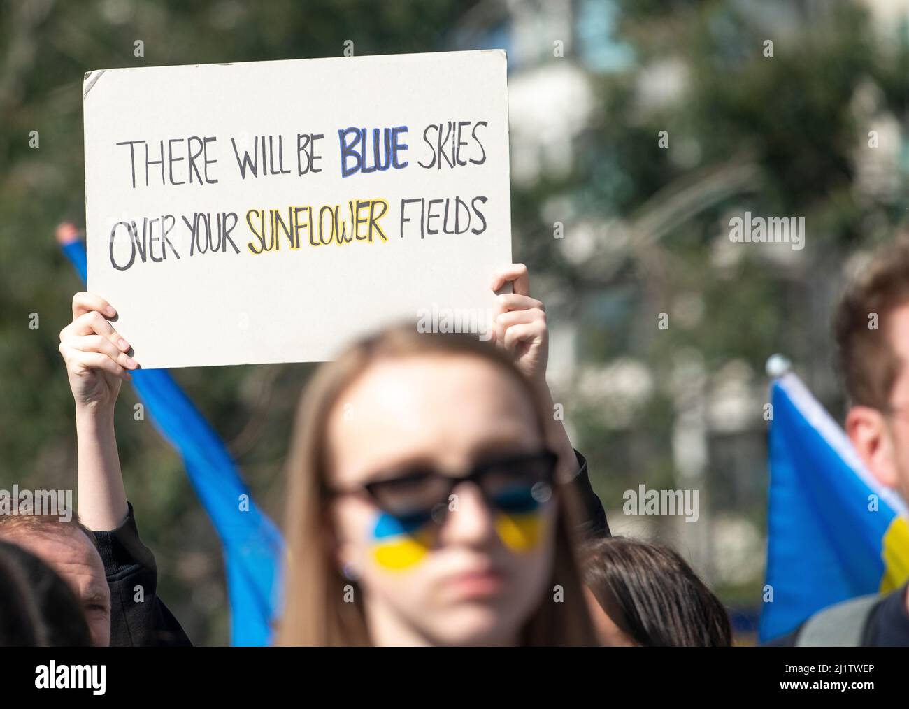 Protesters with signs at the London Stands With Ukraine demonstration ...