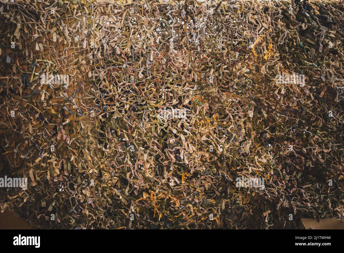 Camouflage net background. Handmade military masking net made of the ...