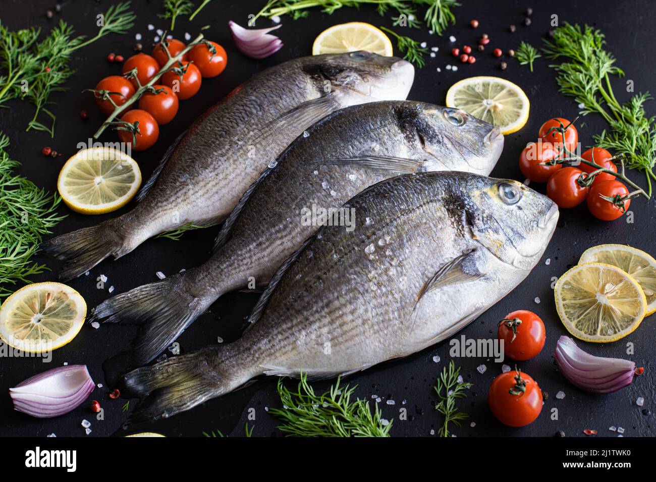 dorado fish on black background Stock Photo - Alamy
