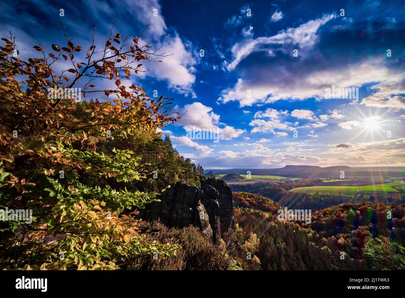 Landscape with rock formations and colorful trees in Schmilka area of ...