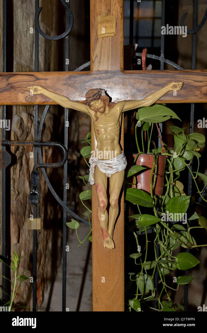 Crucifixion of Jesus Christ in a church. Jesus Christ on a wooden cross ...