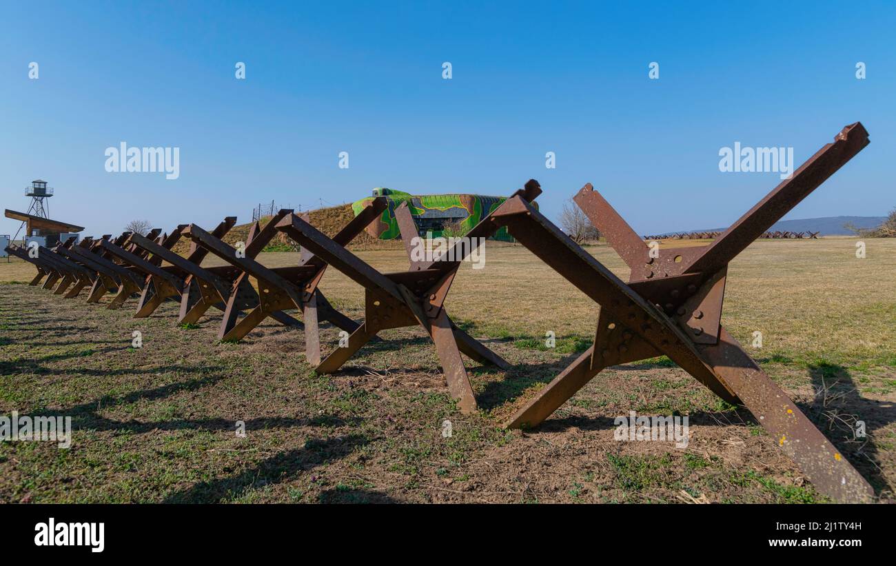 Old army road near Cizov village with roadblock and wires in national ...