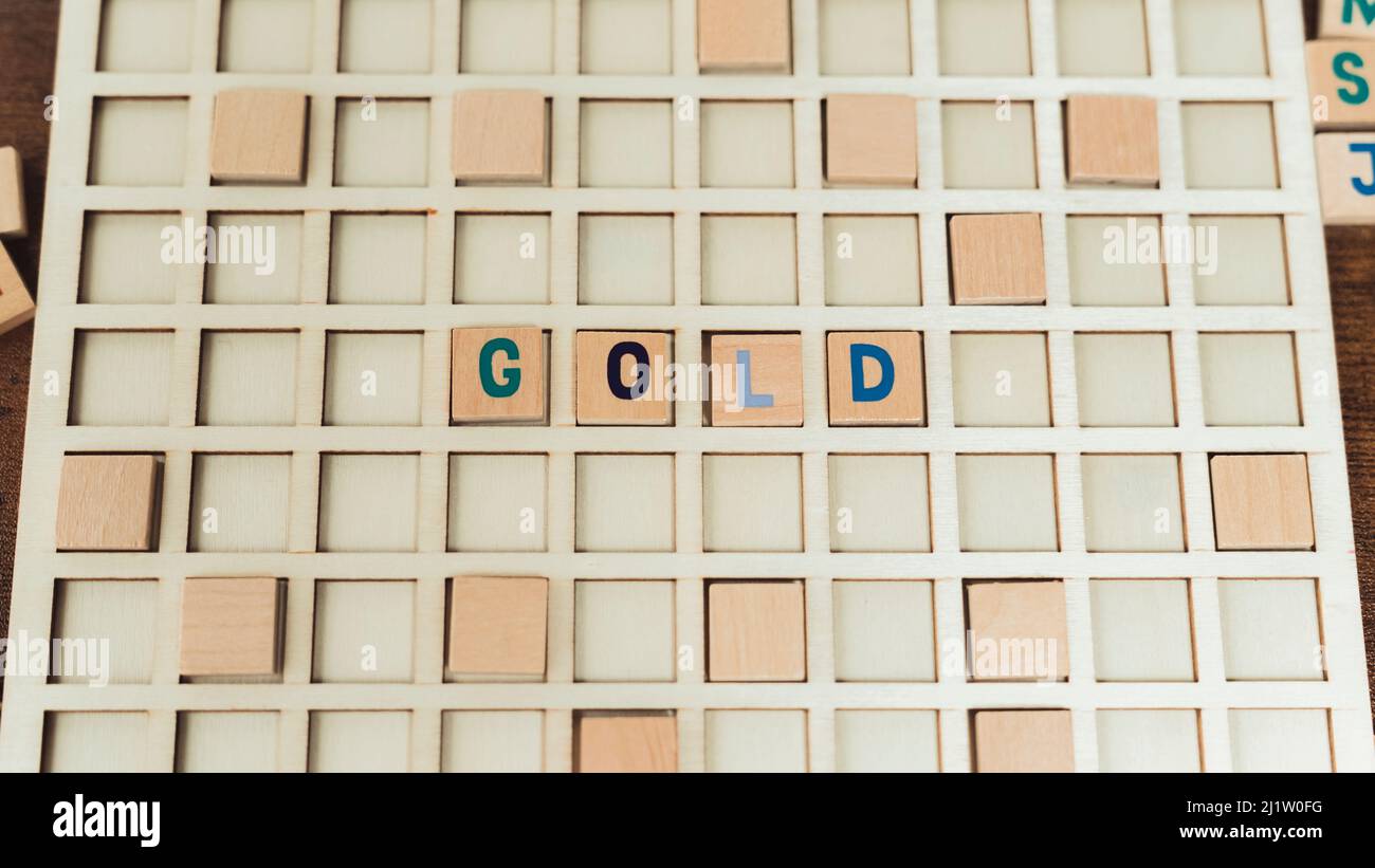 A word GOLD made of wooden alphabet letters vocabulary game . High ...