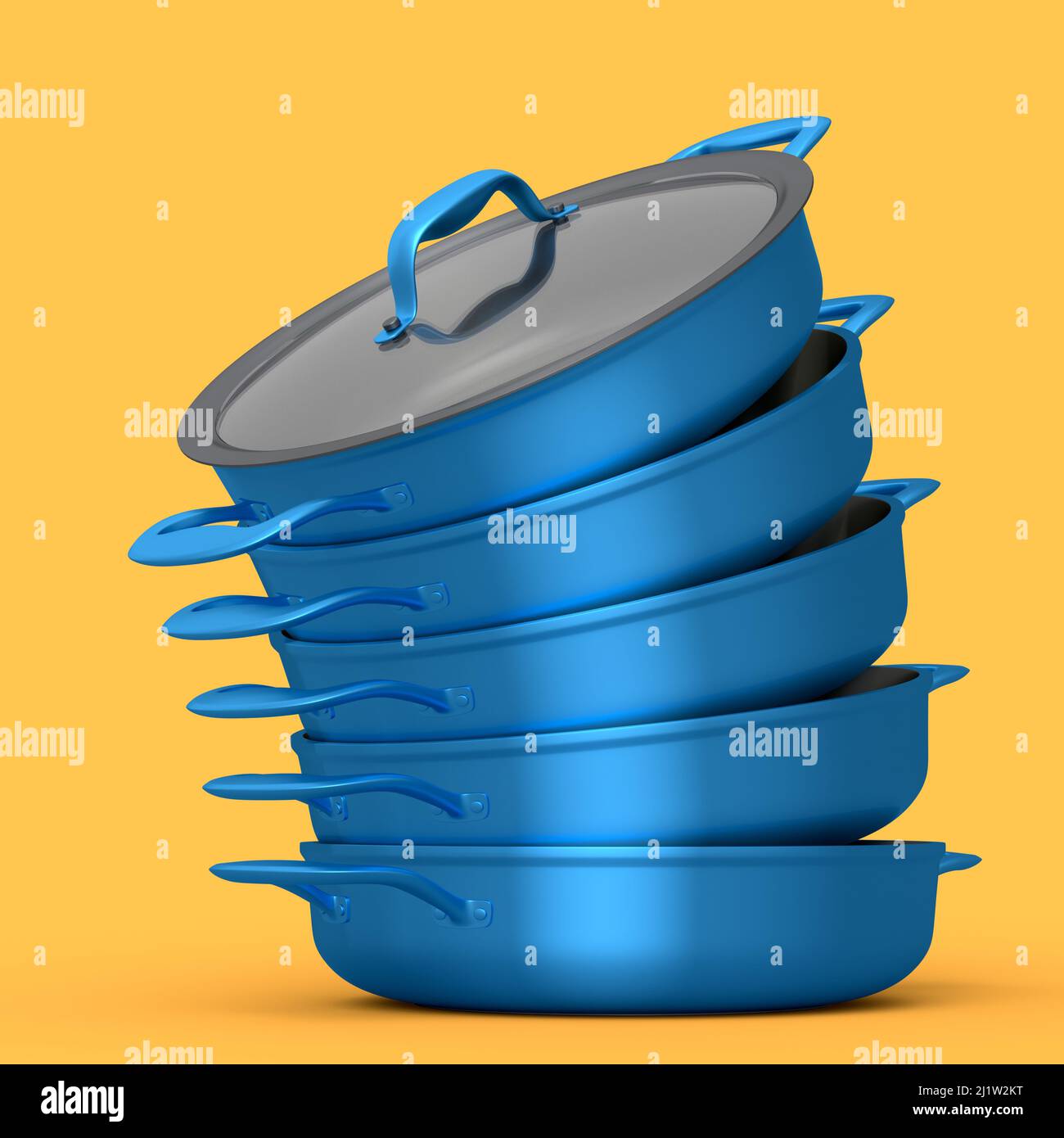 Set of stainless steel stewpot and chrome plated cookware on yellow ...