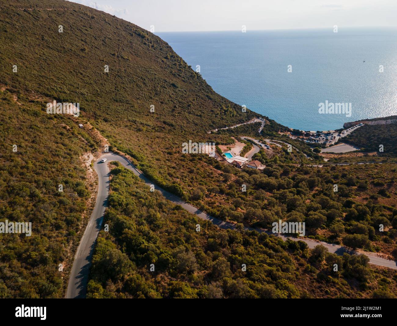 aerial view of car moving by road at Lefkada island Greece near ionian ...
