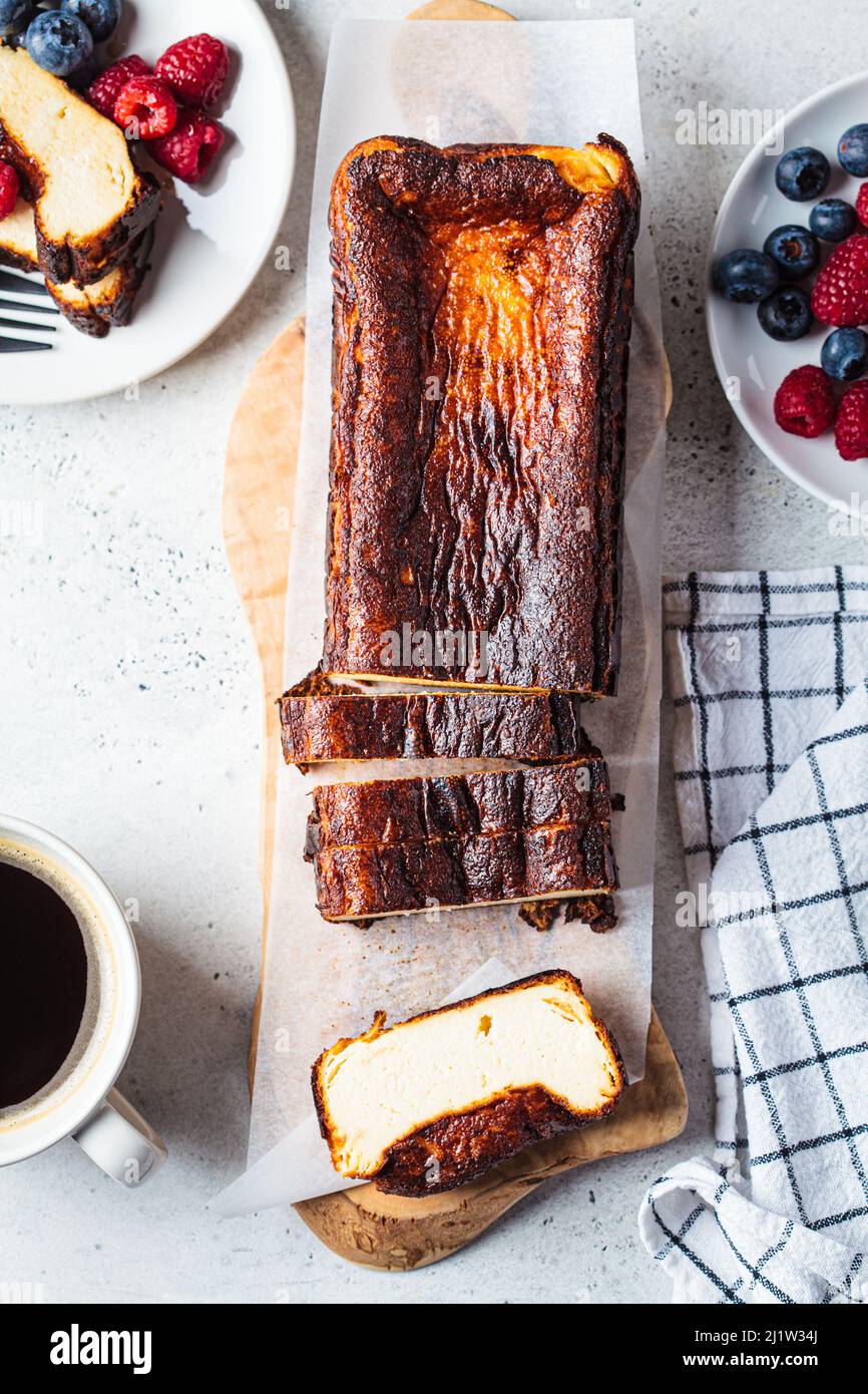 Homemade rectangular San Sebastian burnt cheesecake with berries for ...