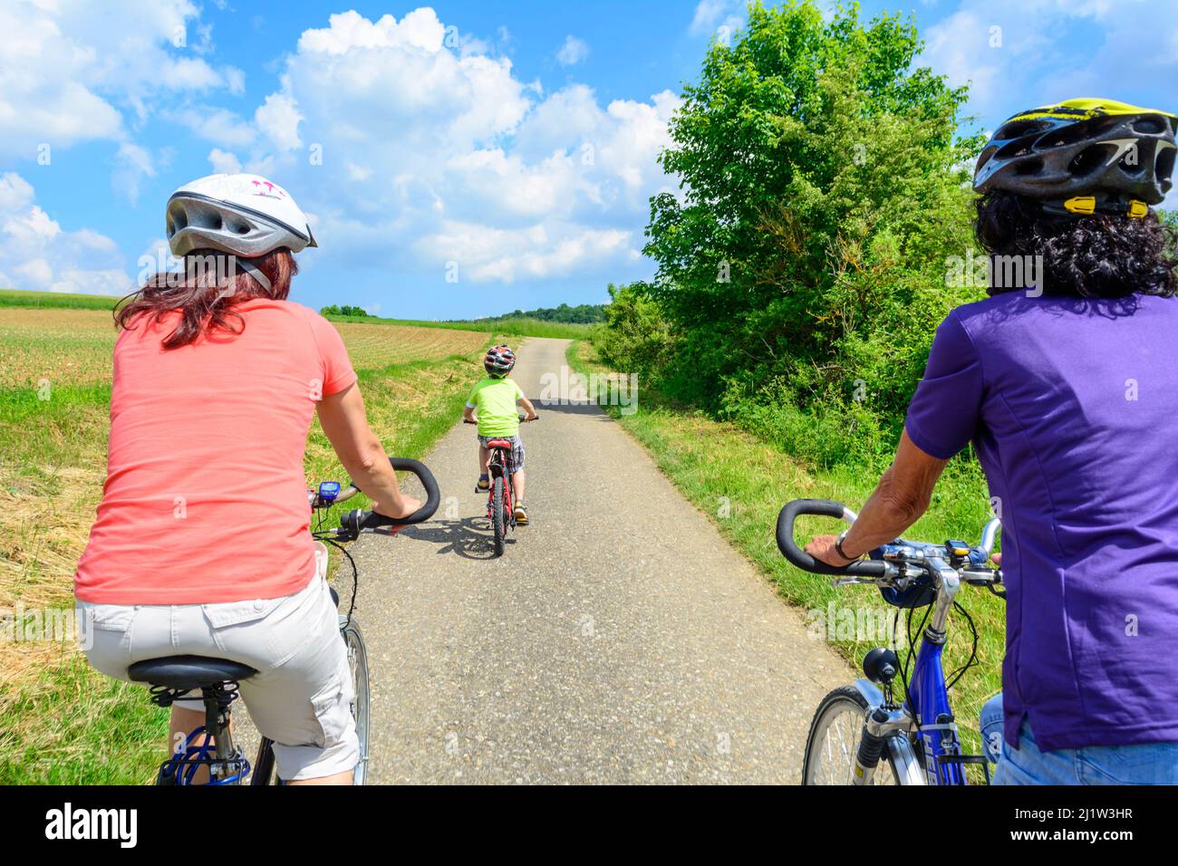 Cycling tour in summertime in rural landscape in germany Stock Photo ...