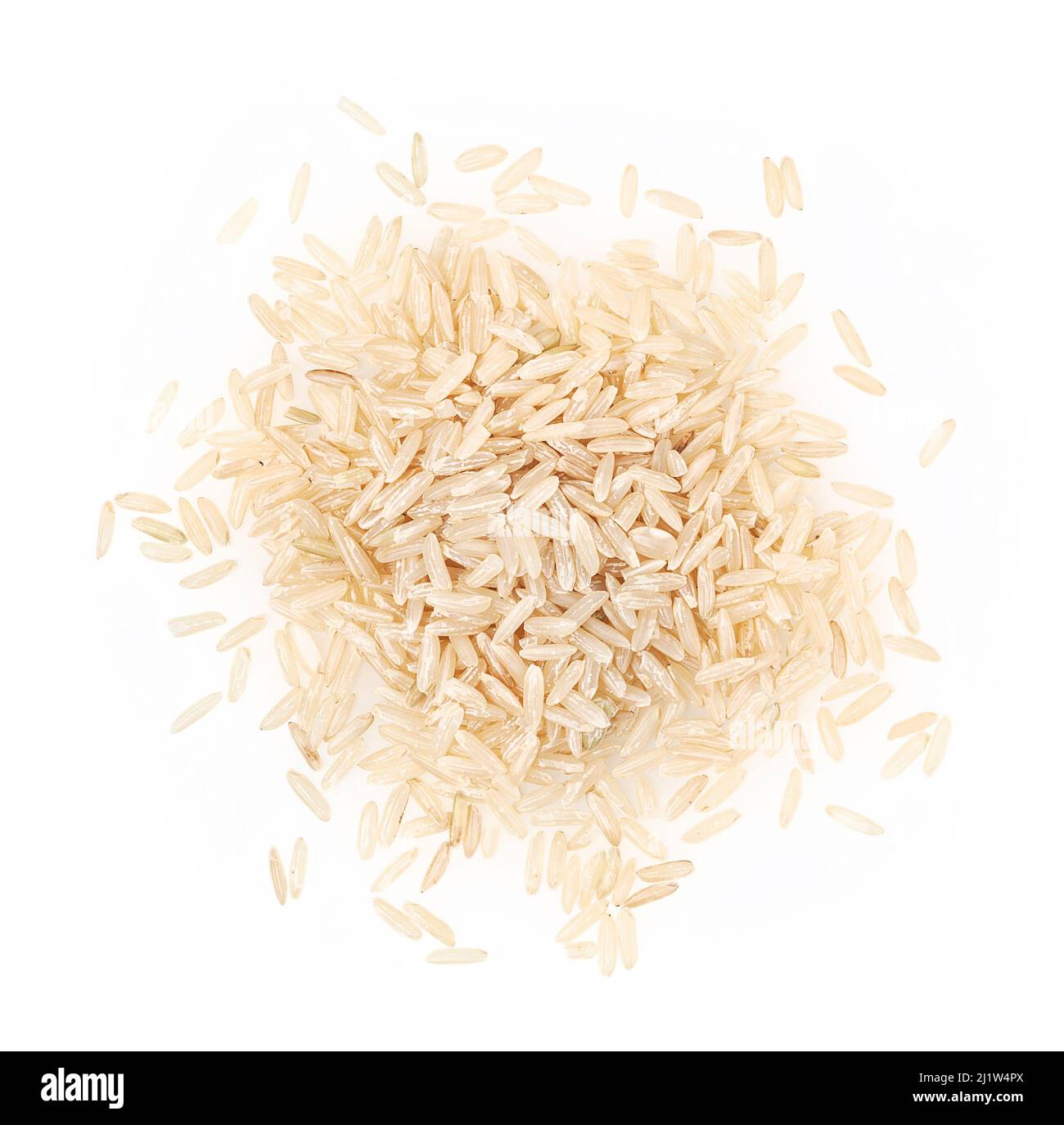 Heap of brown rice isolated on white background Stock Photo - Alamy