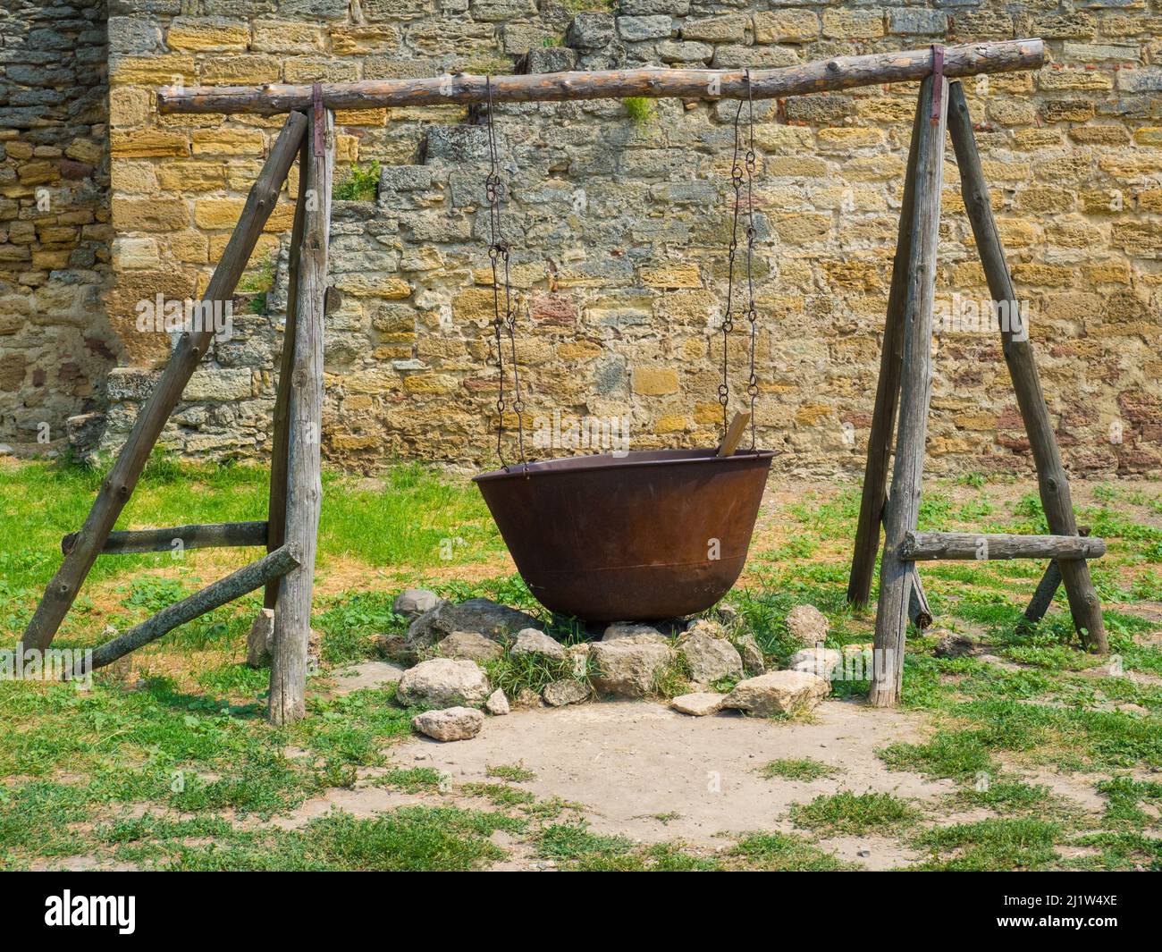 cauldron for cooking on fire Stock Photo - Alamy