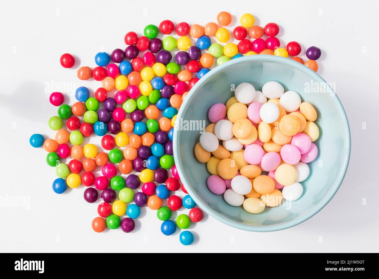 Colorful candies in the bowl, all color candies, white background Stock ...