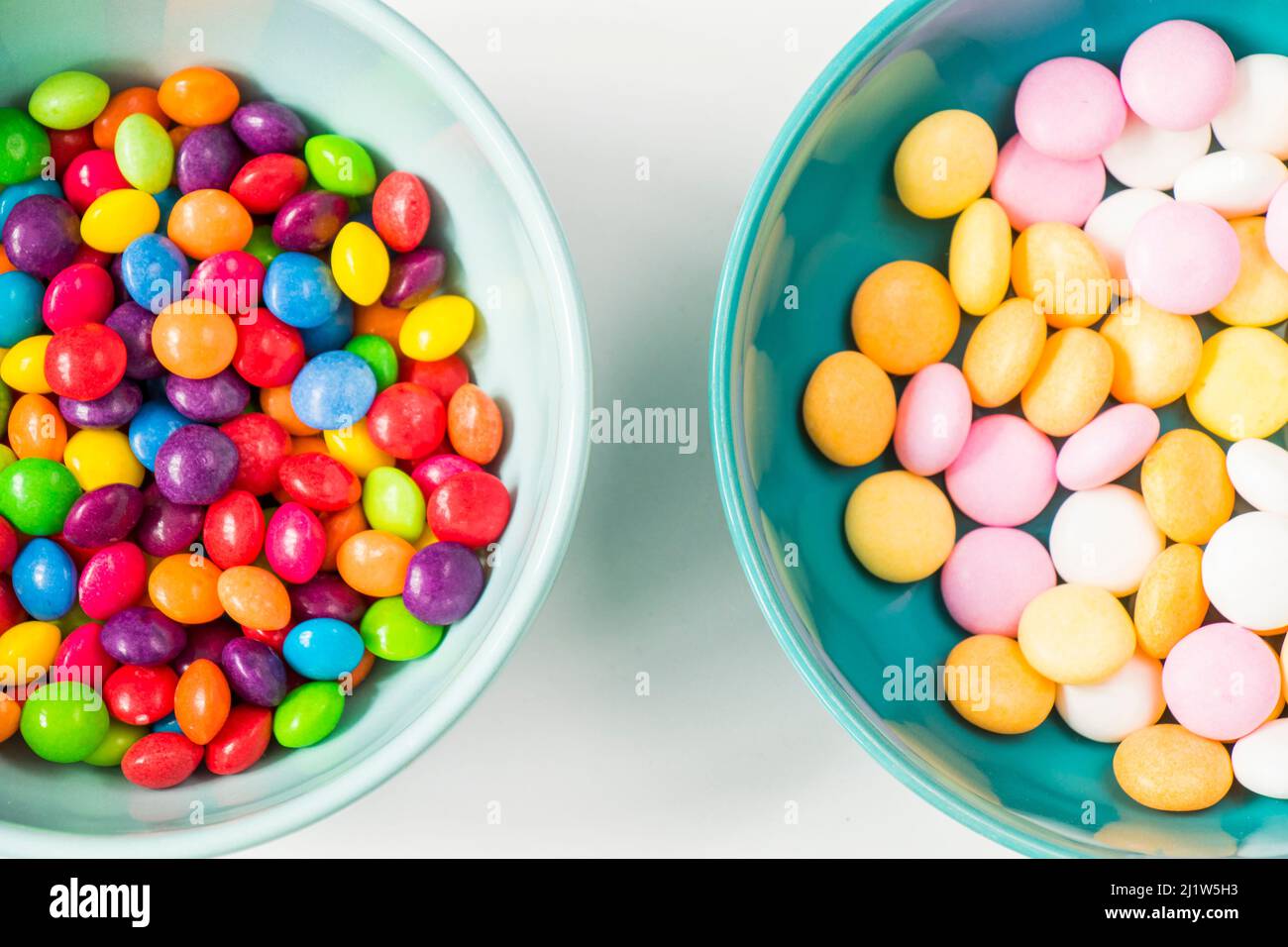 Colorful candies in the bowl, all color candies, white background Stock ...