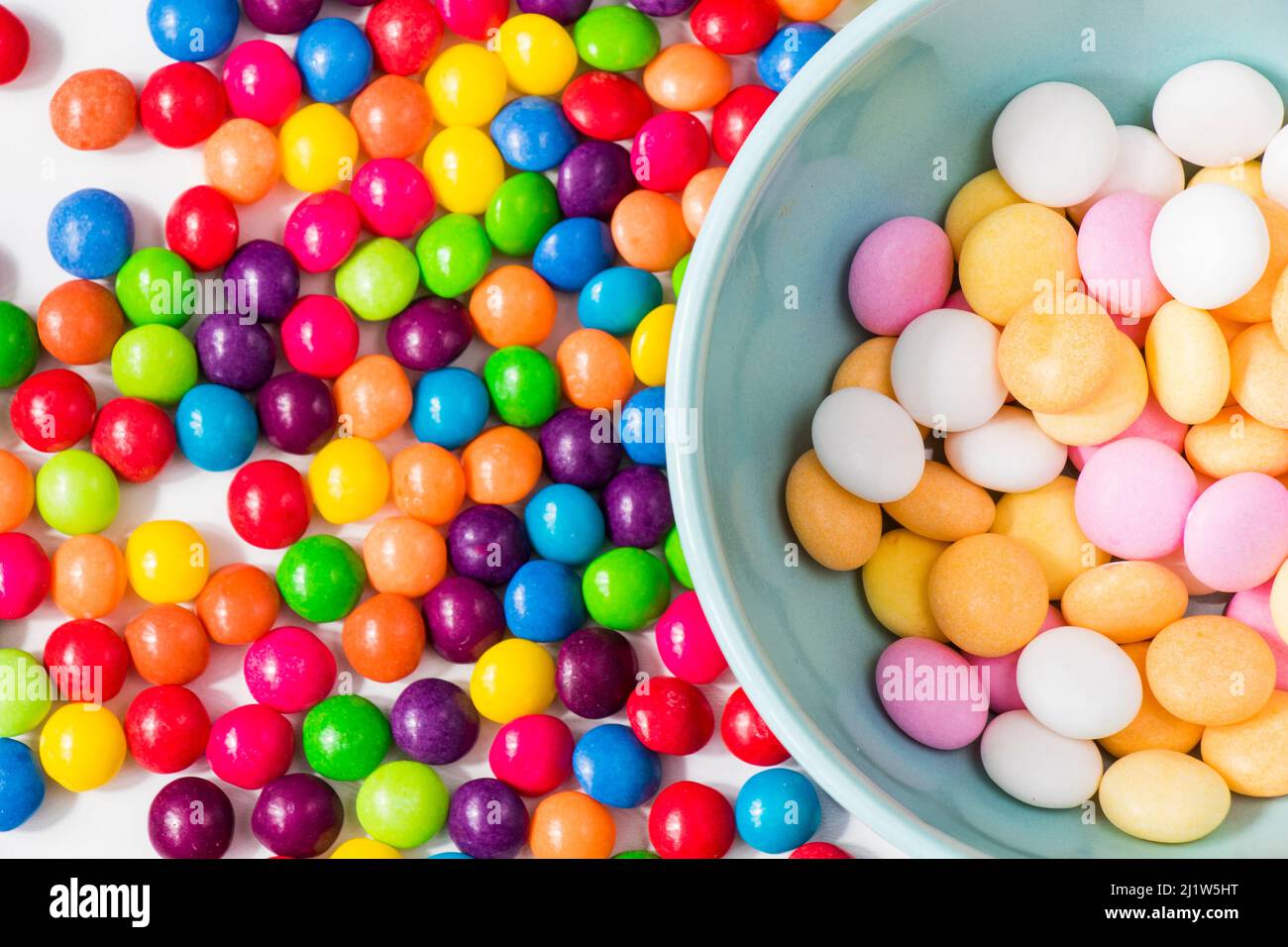 Colorful candies in the bowl, all color candies, white background Stock ...