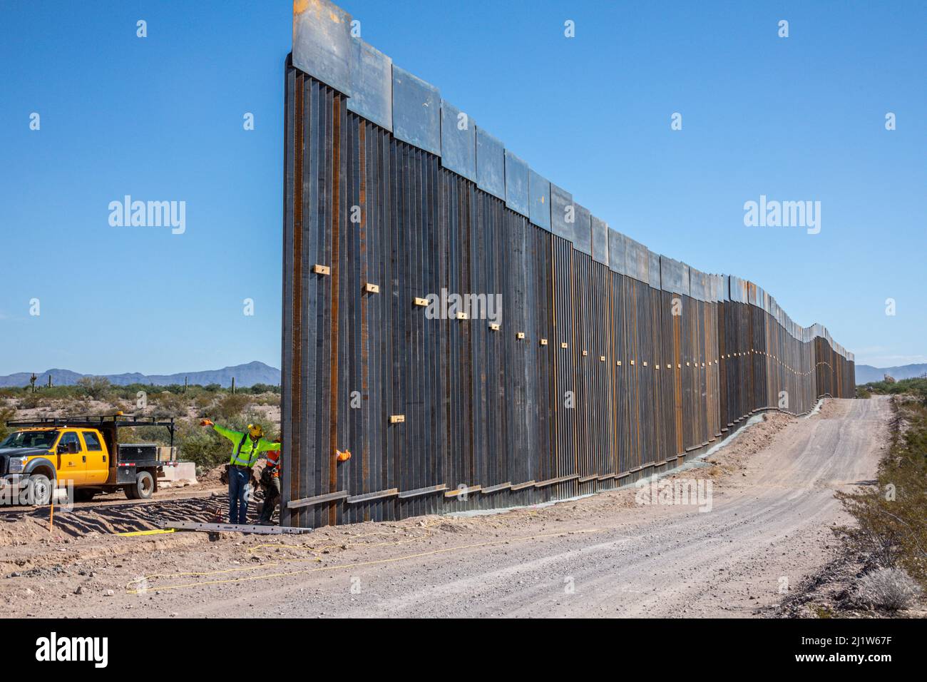 Border wall constuction through the Sonoran Desert. View from Sonoyta ...