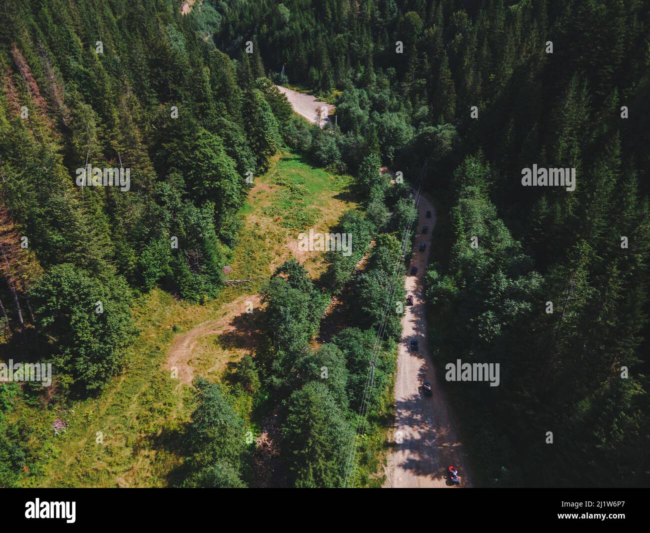 aerial view of quad bike riders at mountain trail road copy space Stock ...