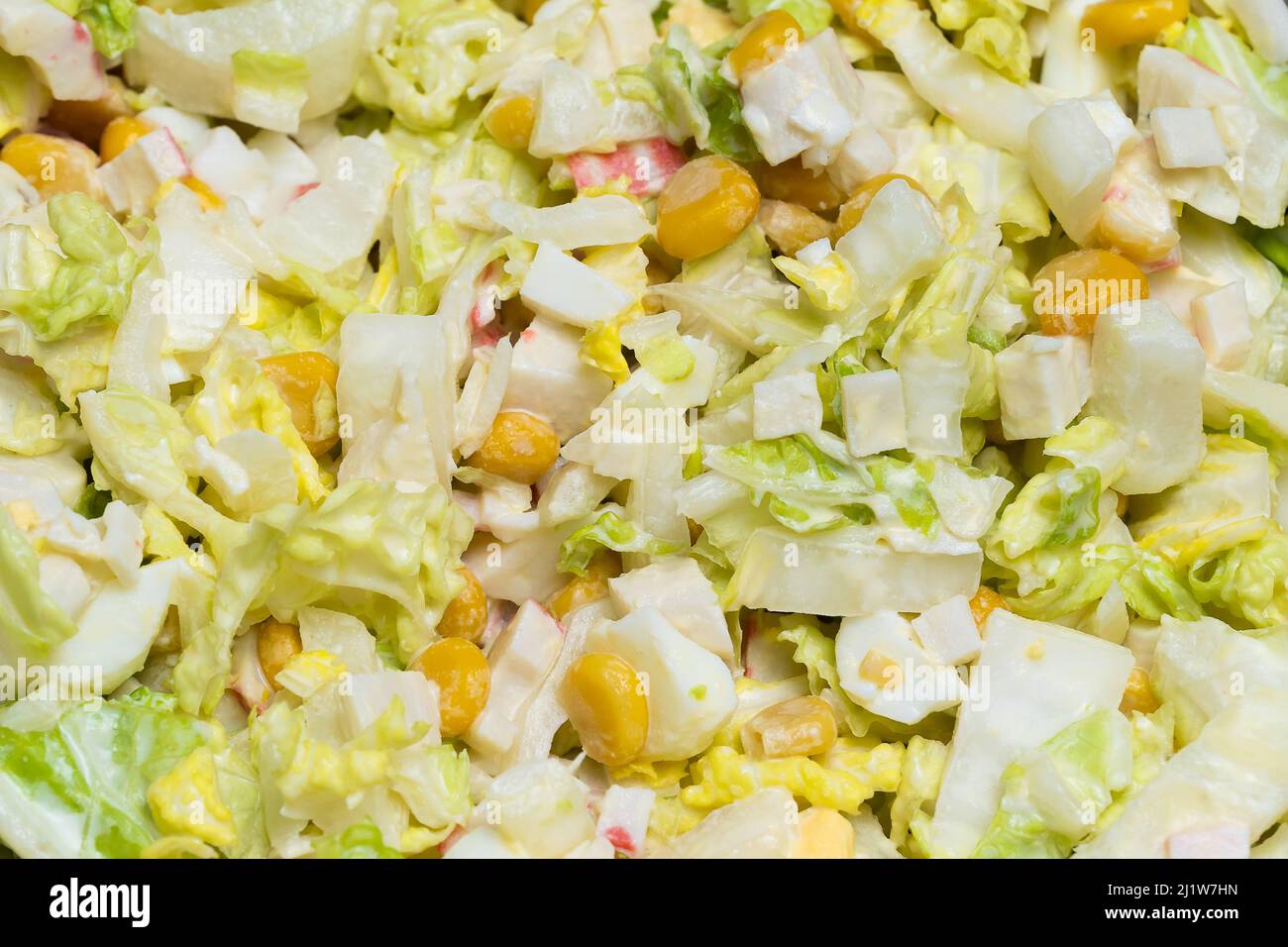 Close-up salad of peking cabbage, corn, crab meat Stock Photo - Alamy