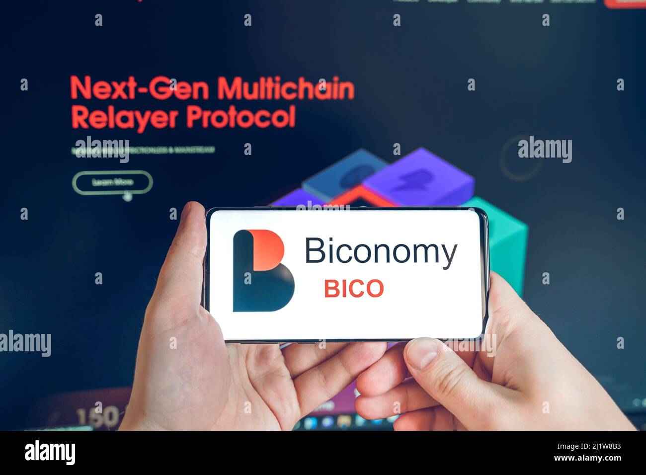 Moscow Russia 25.12.2021 Logo of Biconomy coin in mobile phone ...