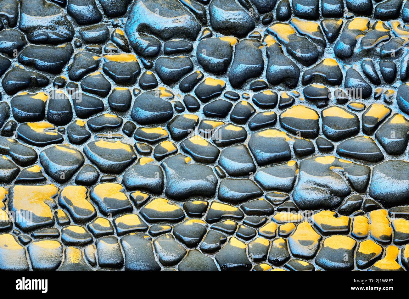 From above abstract background of stones of different shapes and sizes ...