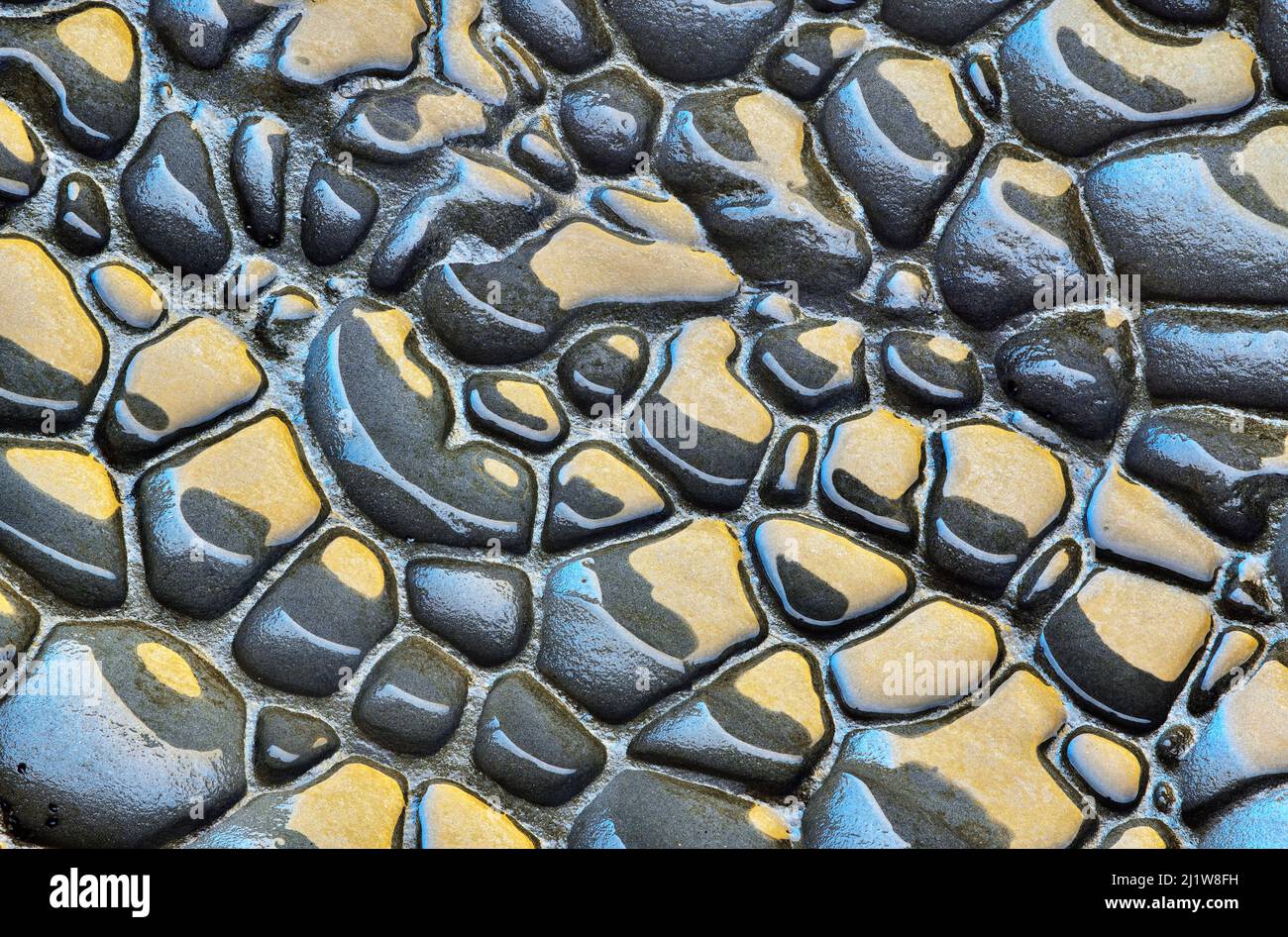 From above abstract background of stones of different shapes and sizes ...