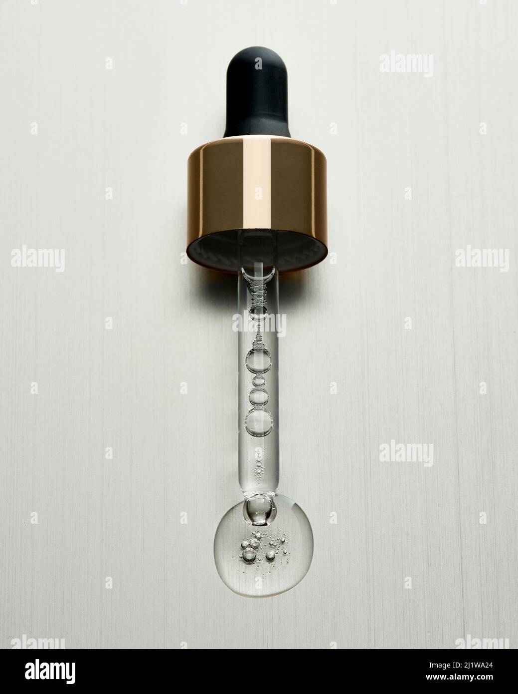 Top view of glass pipette with transparent Hyaluronic acid for skin ...