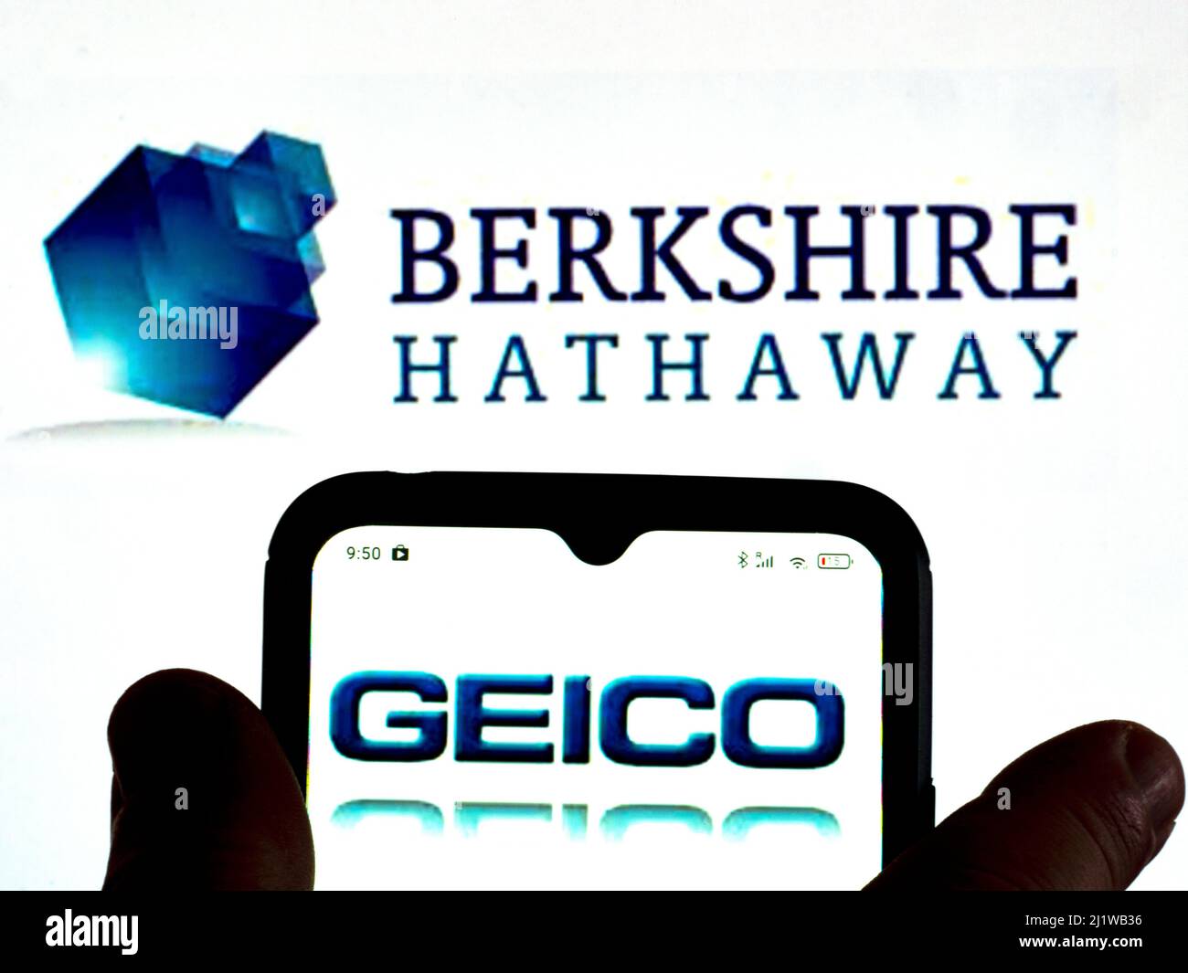 In this photo illustration, the Government Employees Insurance Company (GEICO) logo is displayed ...