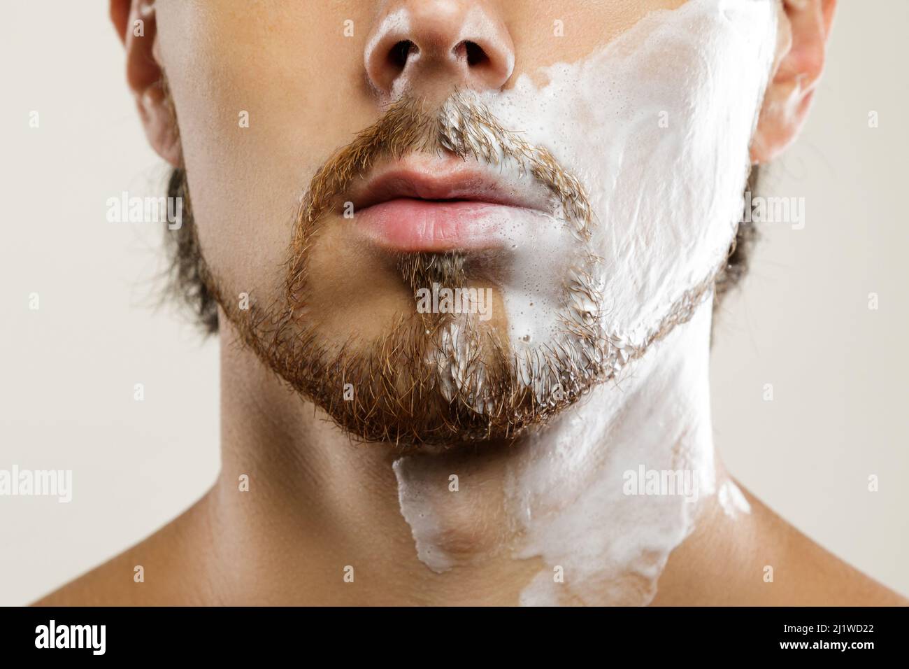 Man with a shaving cream on his face Stock Photo - Alamy