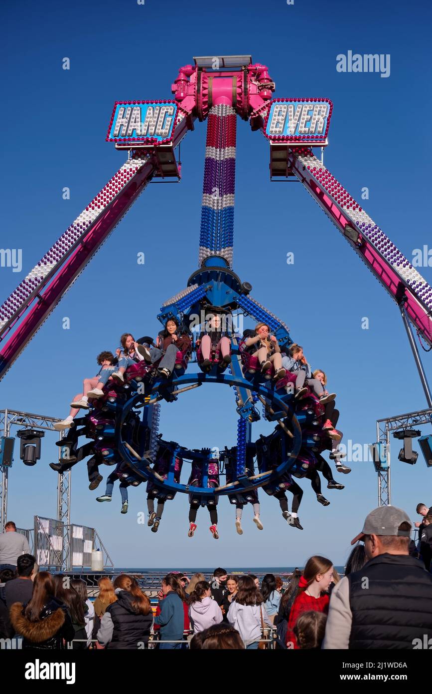 Vertical shot of huge rotator with people inside ready to high-speed ...