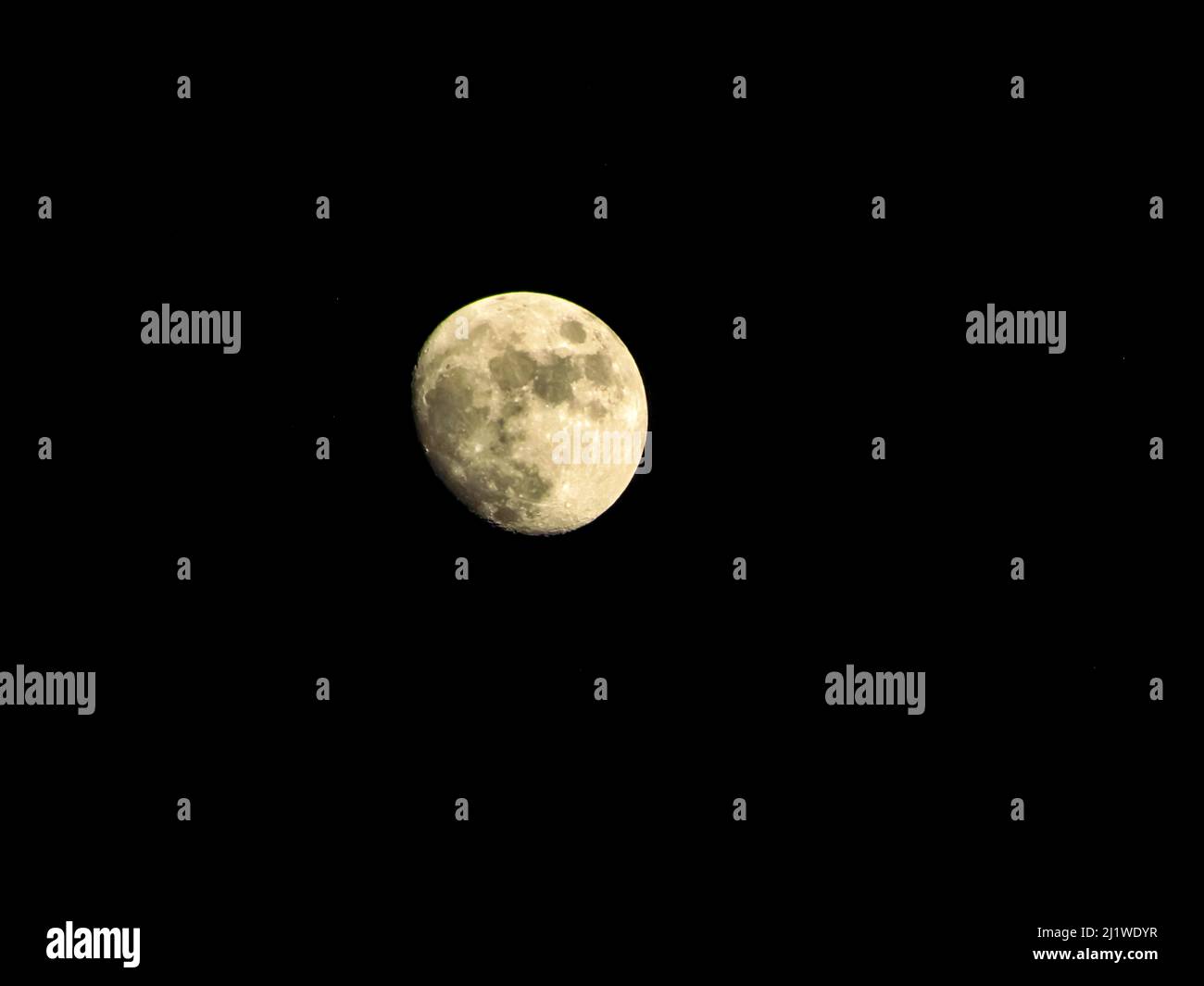 A breathtaking view of a full moon at late night Stock Photo - Alamy