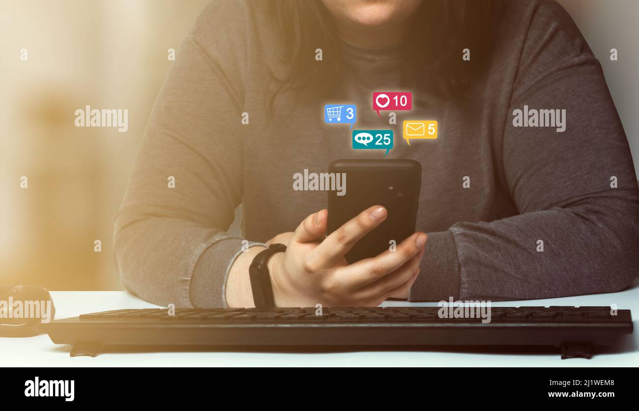 Woman using social media marketing interface on smartphone with ...