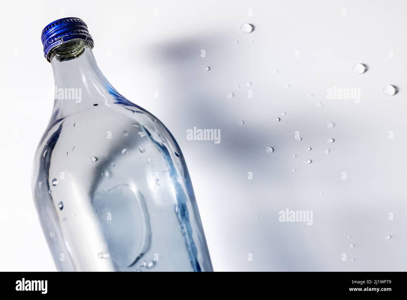 Glass water bottle top view isolated on white background Stock Photo ...