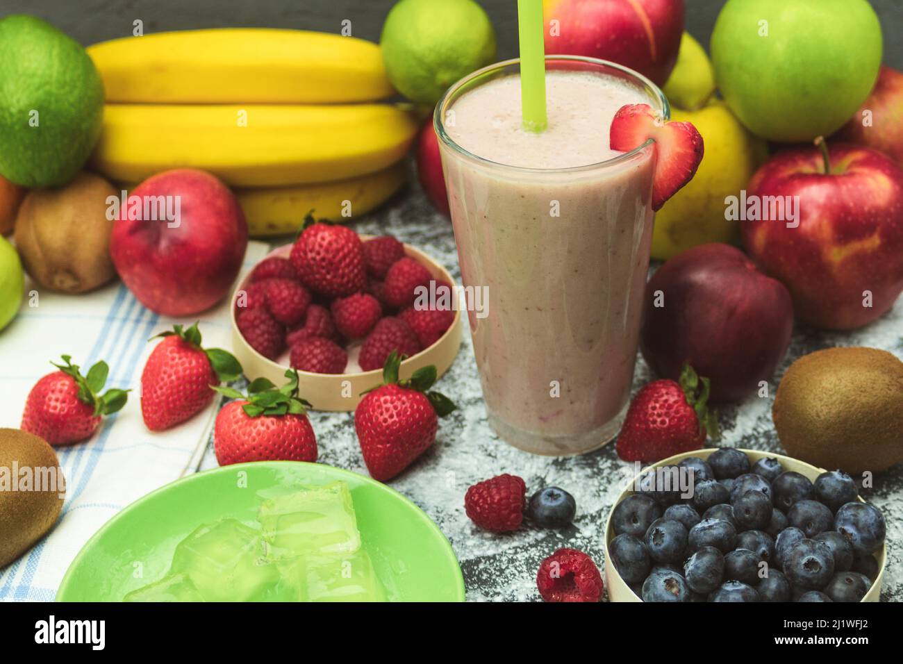 Delicious fruit smoothie made from fresh fruits. A glass of freshly ...