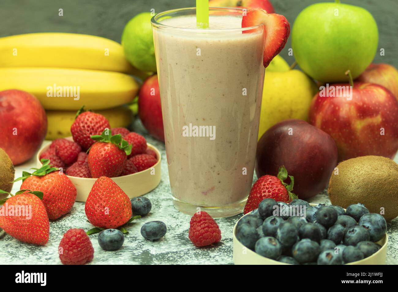 Delicious fruit smoothie made from fresh fruits. A glass of freshly ...