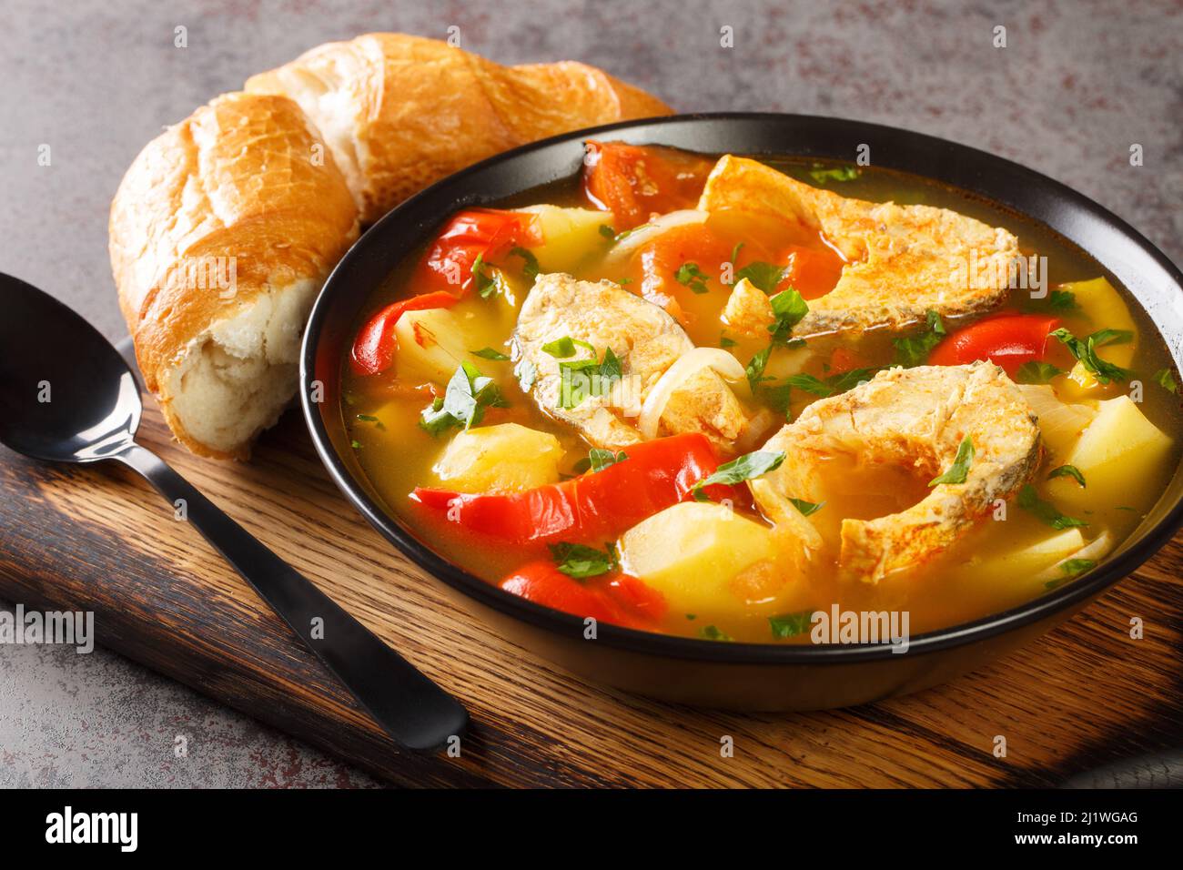 Caldeirada de peixe made of onions, garlic, tomatoes, red peppers ...