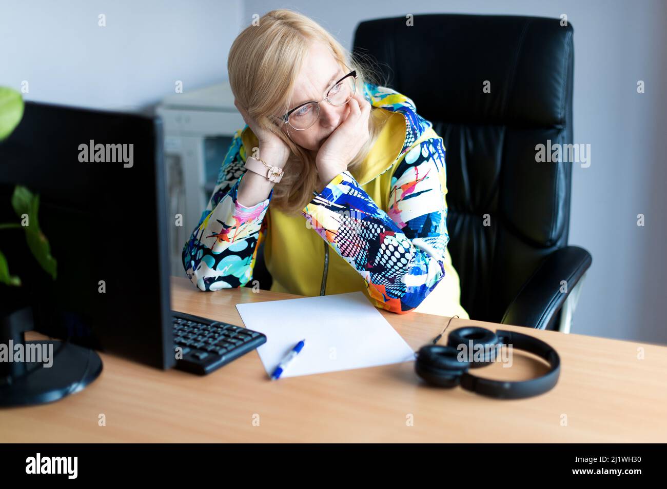 Middle aged tired, stressed and frustrated business woman desperate ...