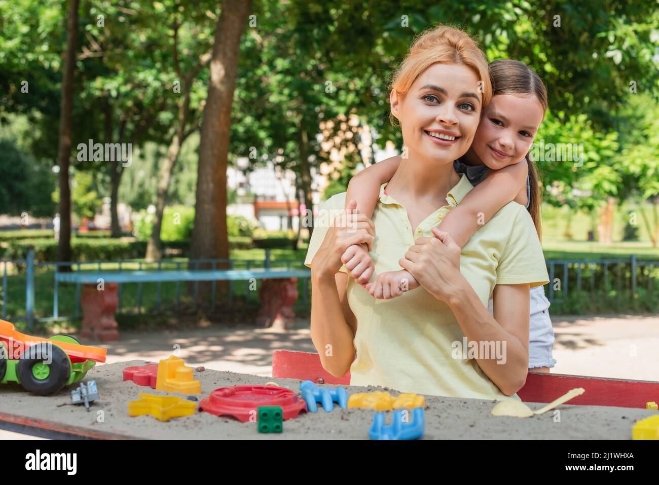 Mom daughter happy playground family hi-res stock photography and ...