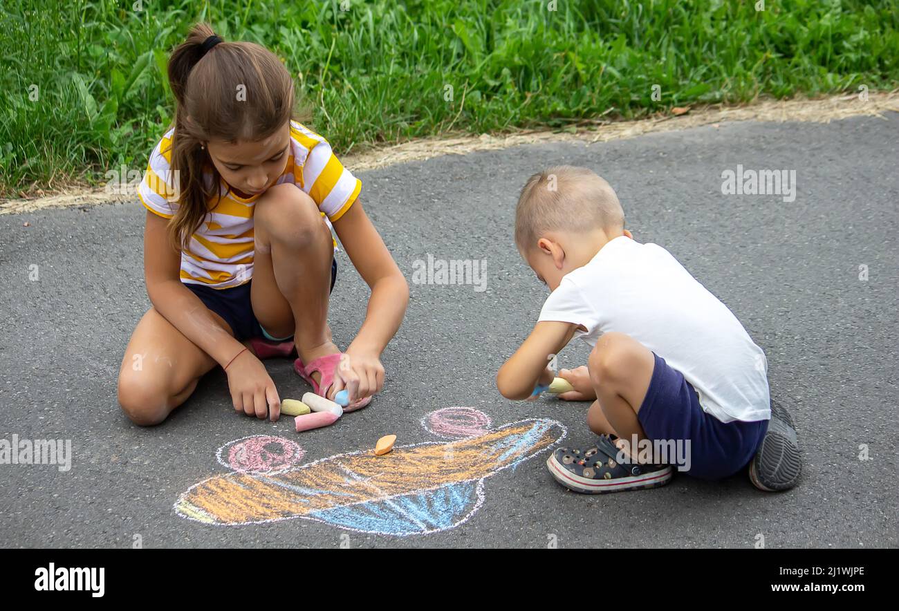 Child pavement chalk hi-res stock photography and images - Alamy