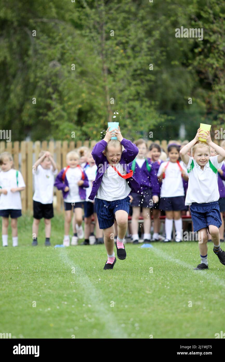 Running races at primary school sportsday Stock Photo - Alamy