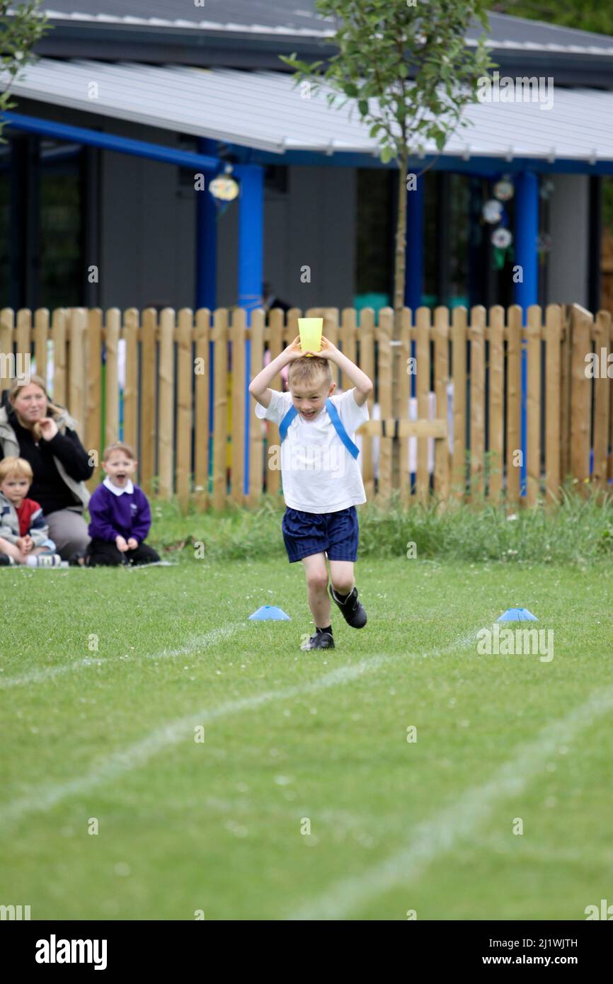 Running races at primary school sportsday Stock Photo - Alamy