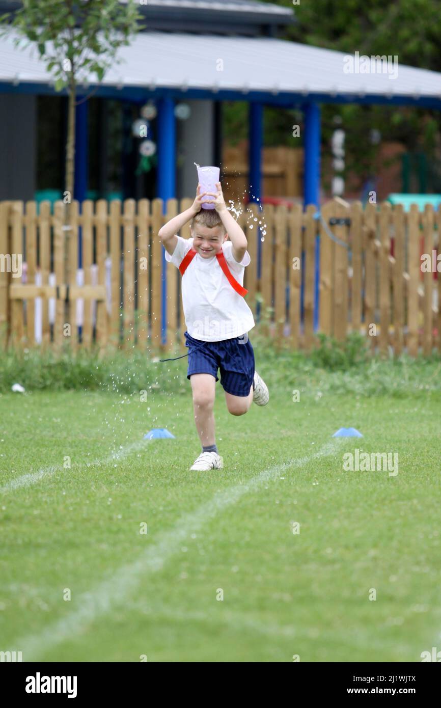 Running races at primary school sportsday Stock Photo - Alamy