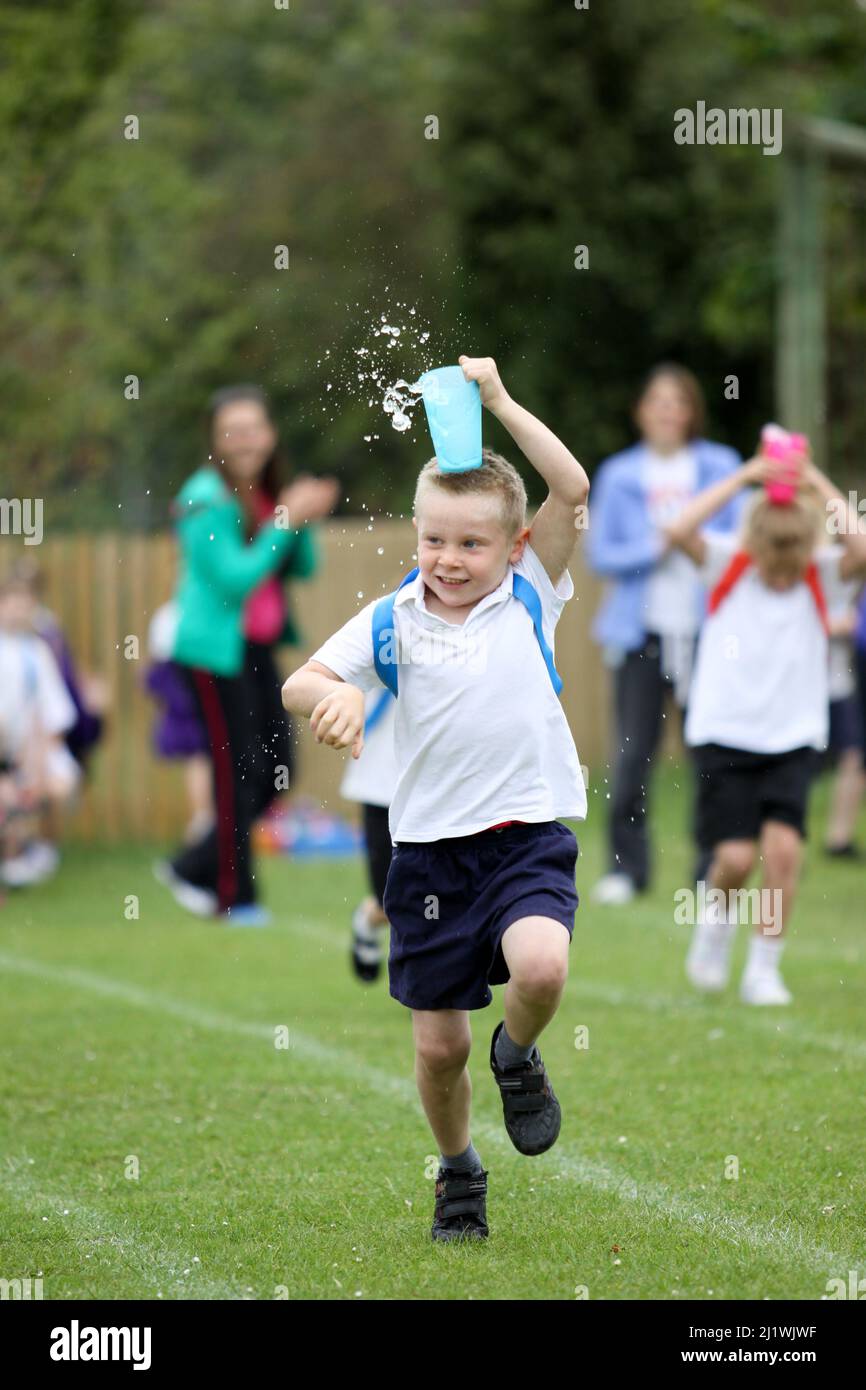 Running races at primary school sportsday Stock Photo - Alamy