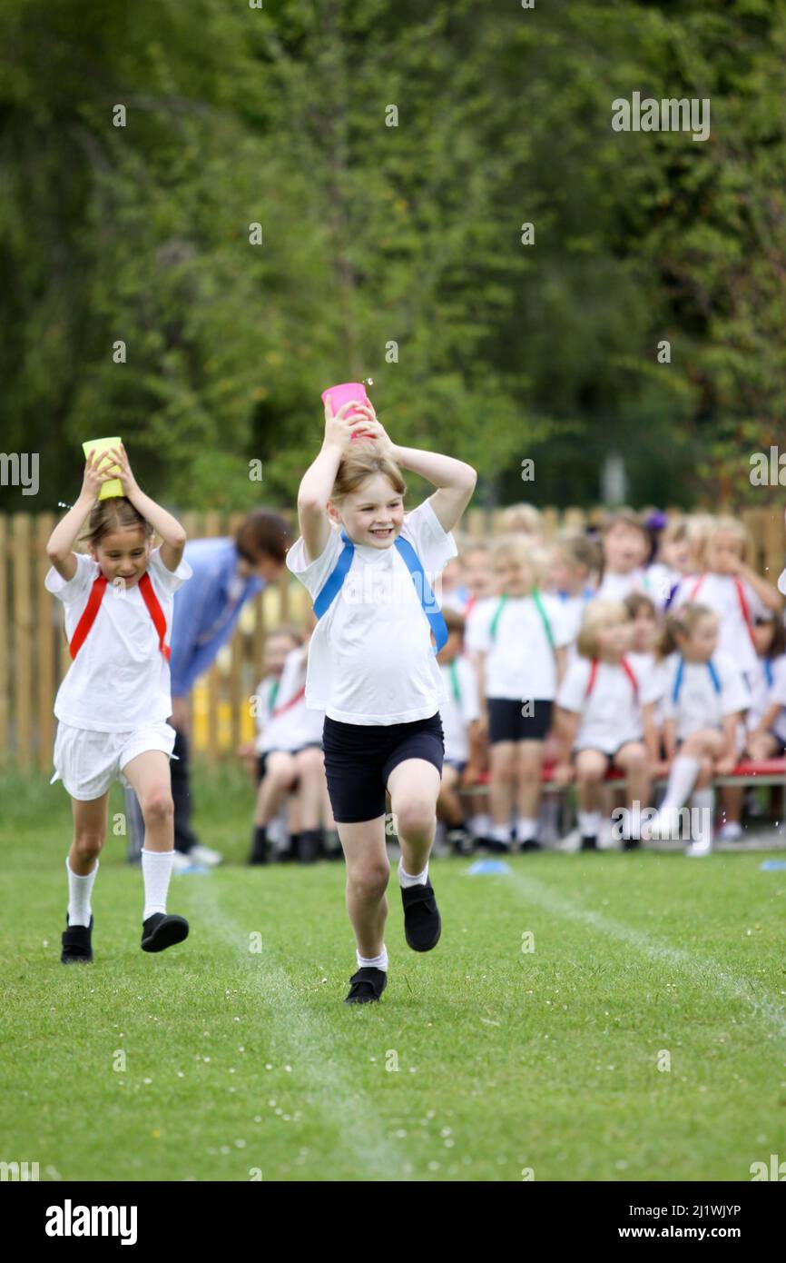 Running races at primary school sportsday Stock Photo - Alamy