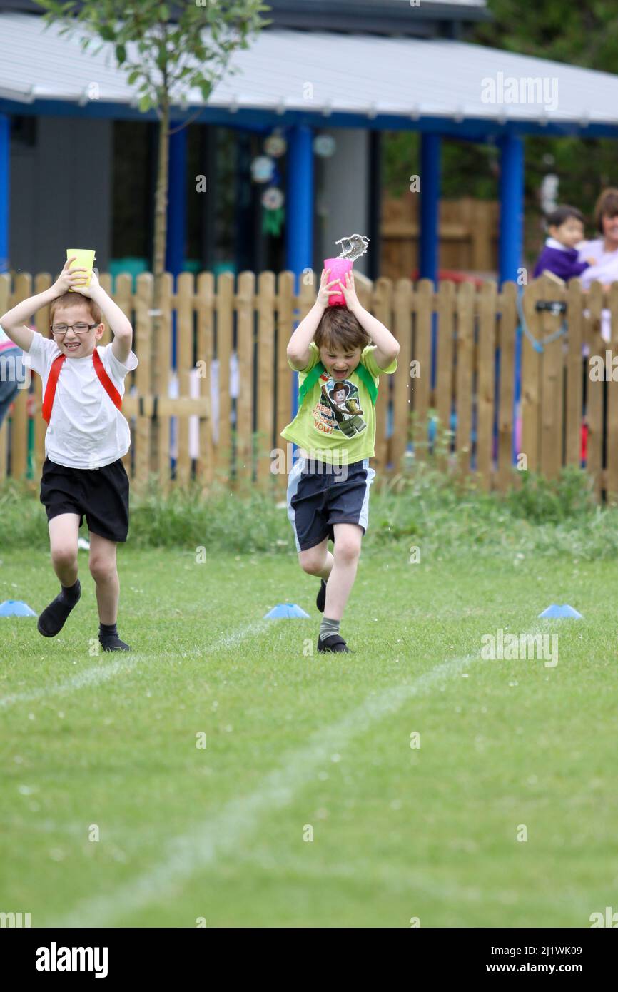 Running races at primary school sportsday Stock Photo - Alamy