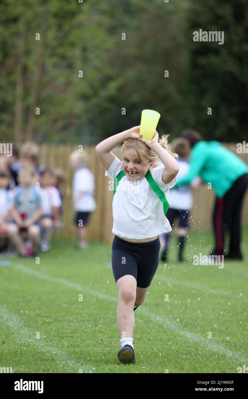 Running races at primary school sportsday Stock Photo - Alamy