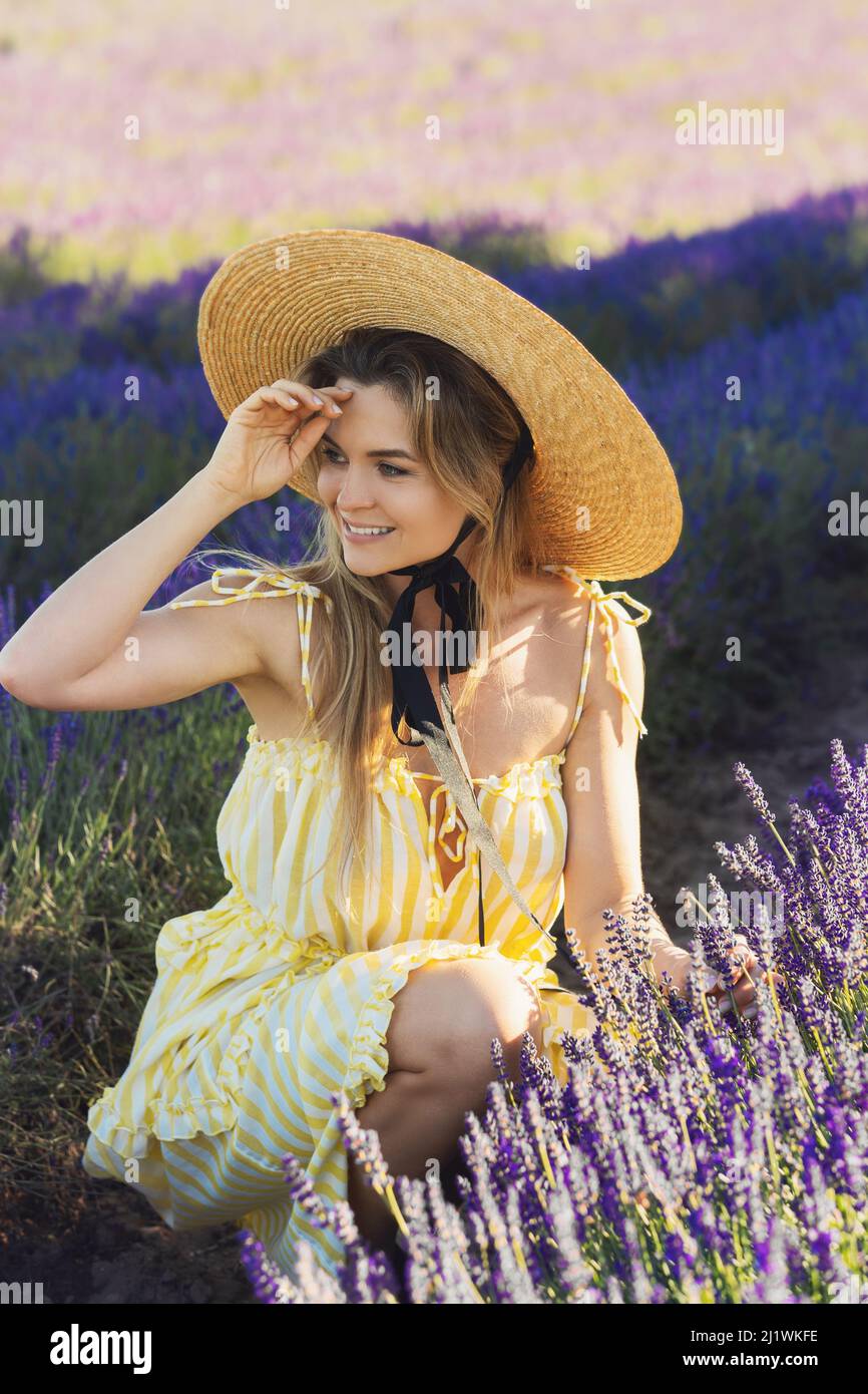 Beautiful and young girl in a lavender field Stock Photo - Alamy