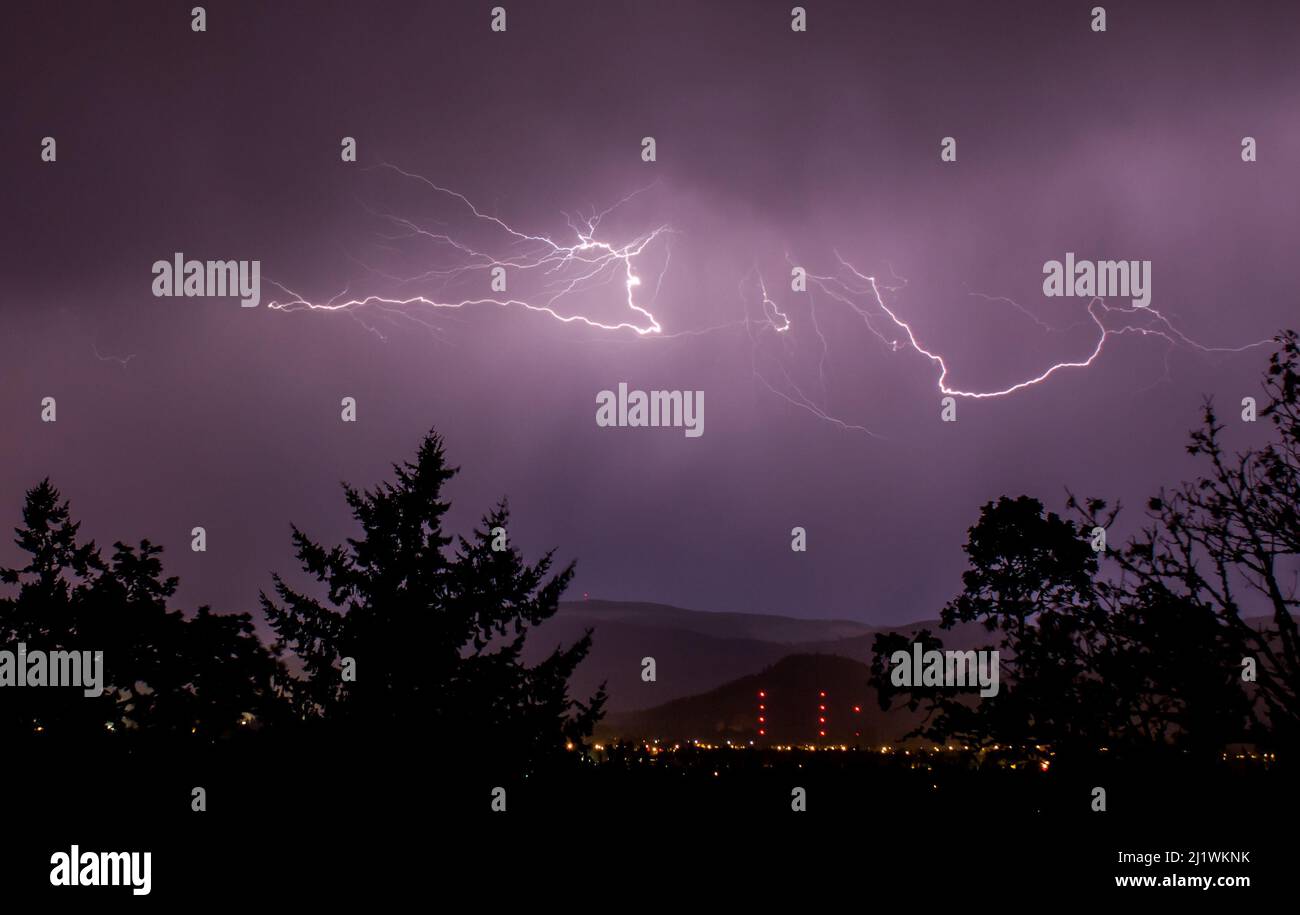 A beautiful view of a lightning strike in the dark sky Stock Photo - Alamy