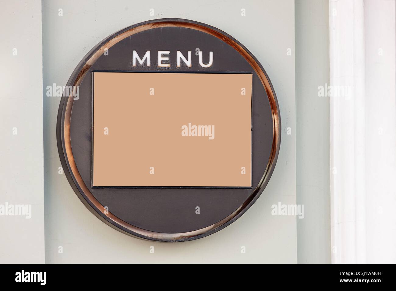 Restaurant signboard design mockup. Blank for the menu in a round metal ...
