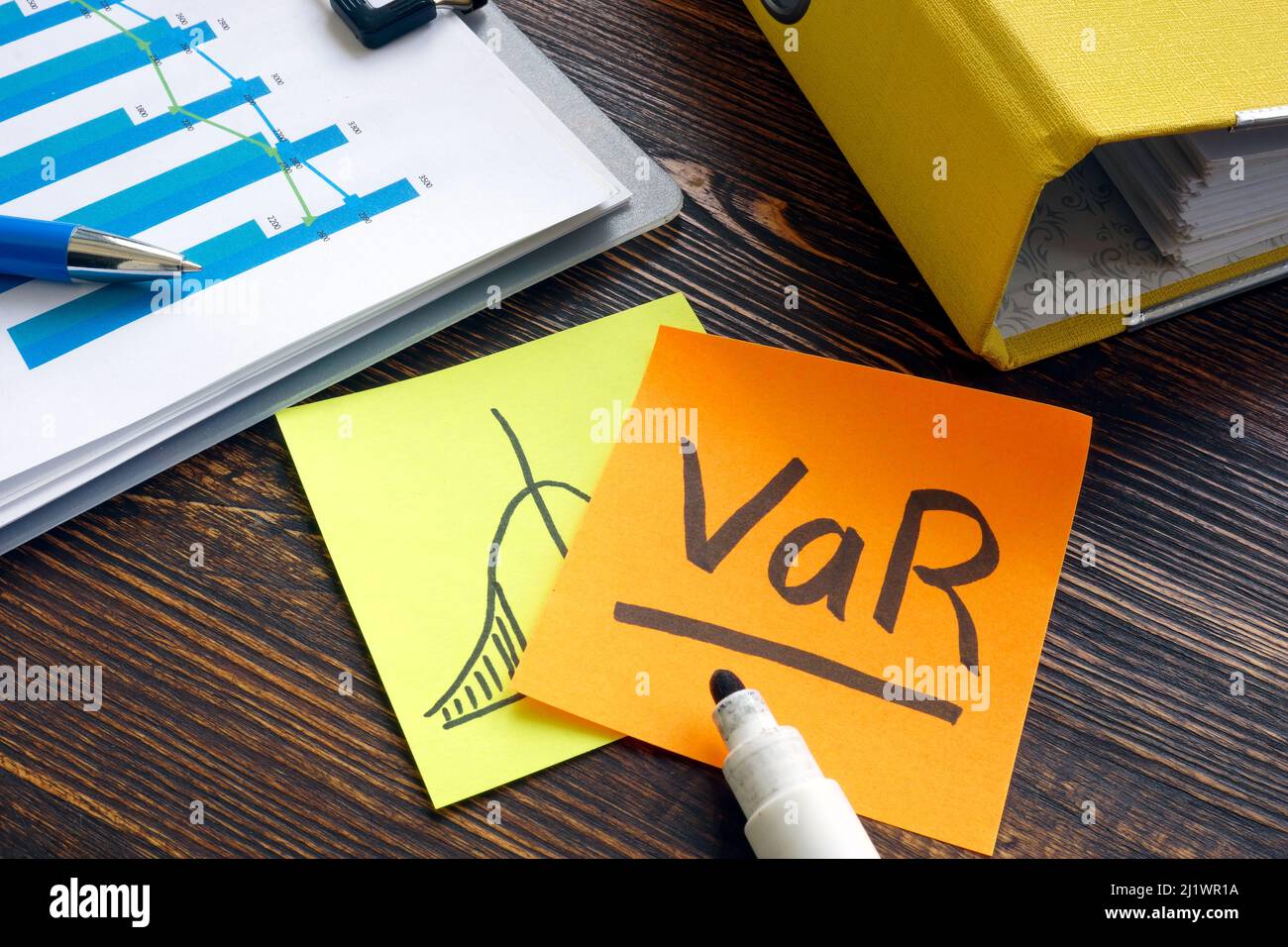 Sign VaR Value at Risk on the sticker and graph Stock Photo - Alamy