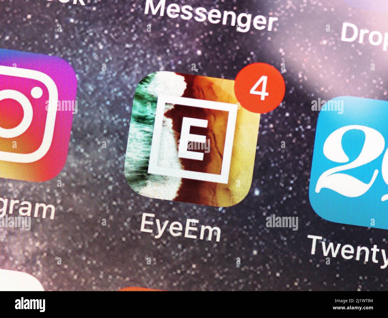 An EyeEm mobile app on a smartphone display Stock Photo - Alamy