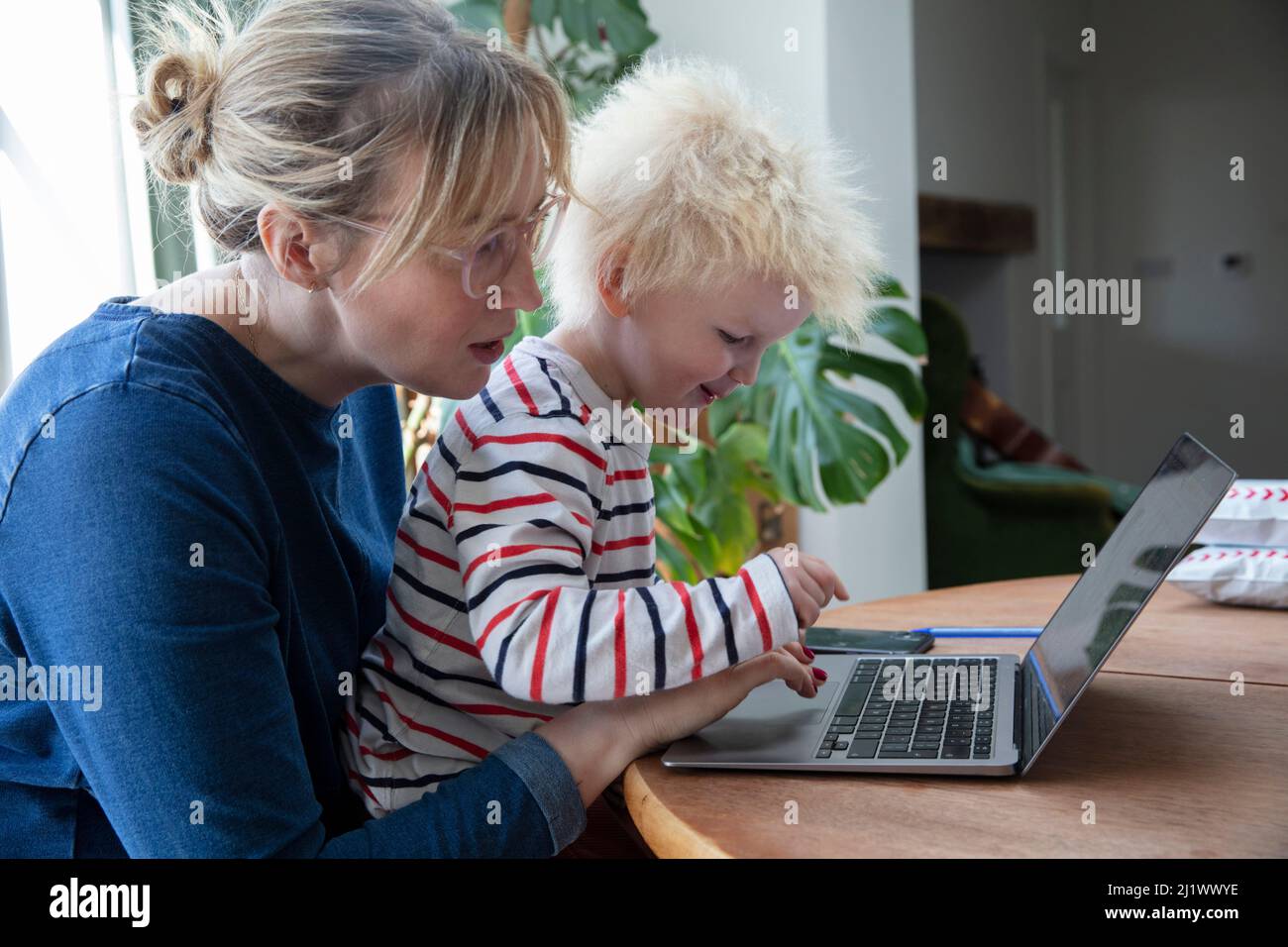 Children working together on computer hi-res stock photography and ...