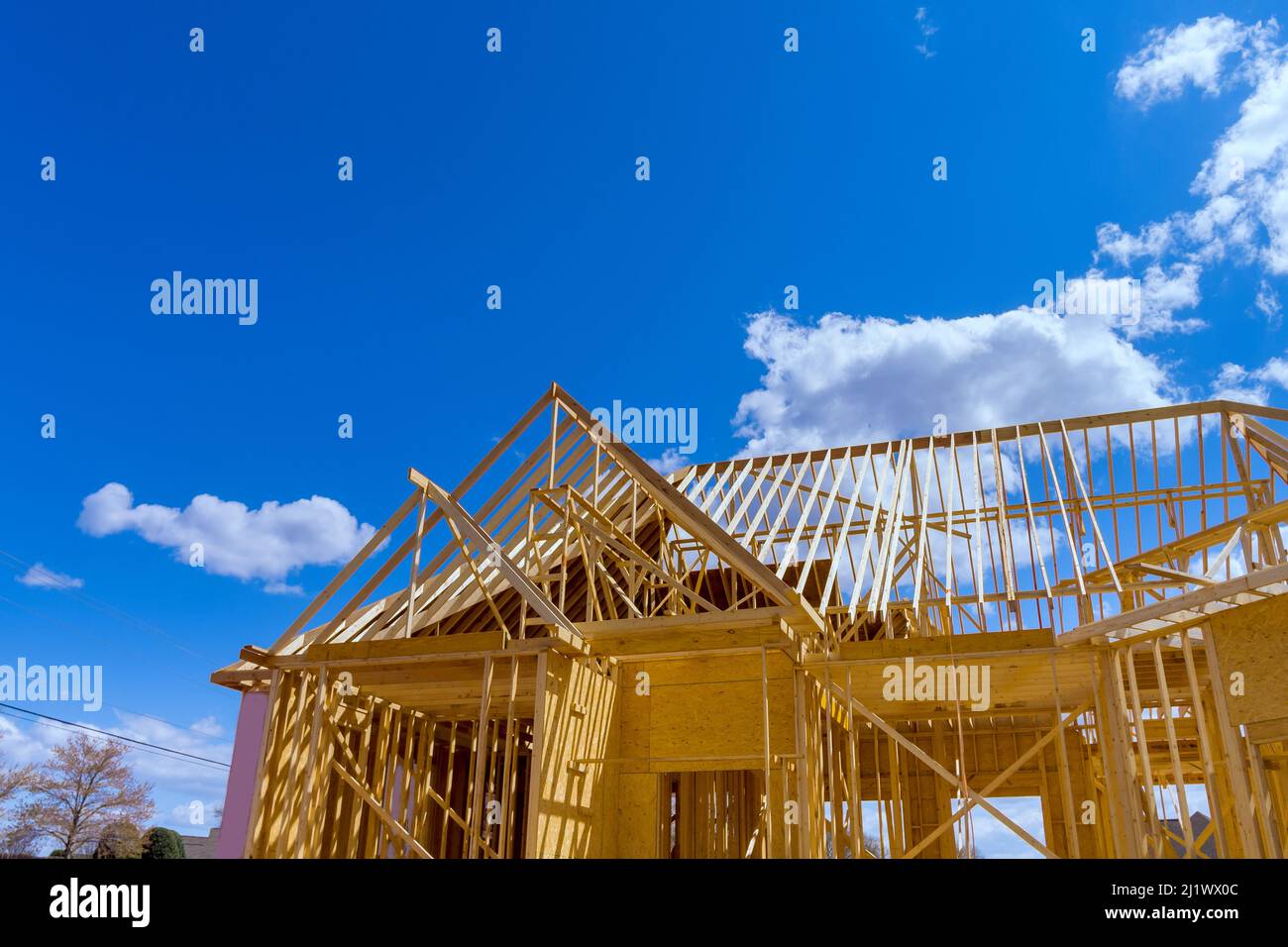 Timber frame house of wooden beam framework on stick built home Stock ...